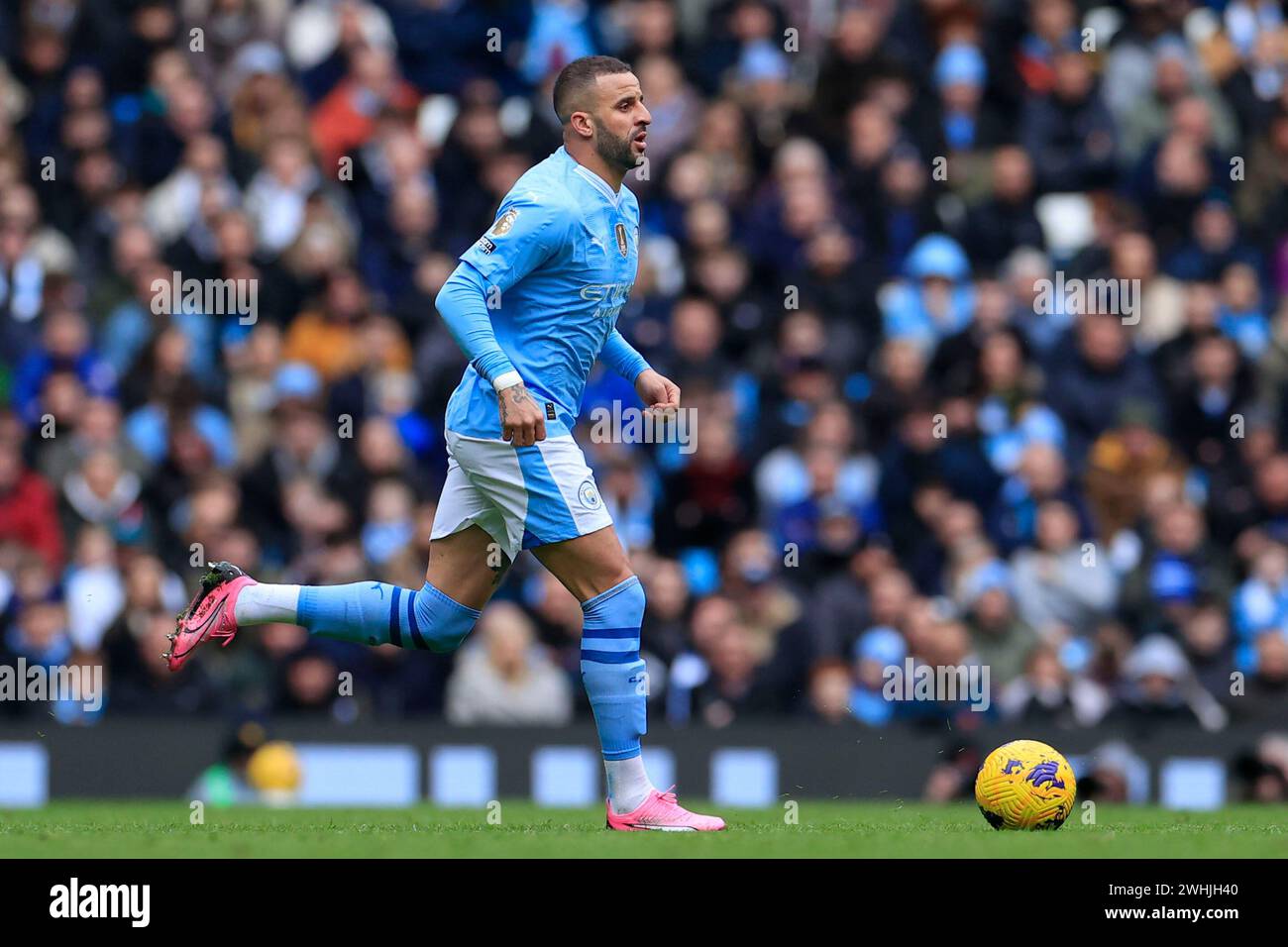 Kyle Walker of Manchester City runs with the ball during the Premier ...