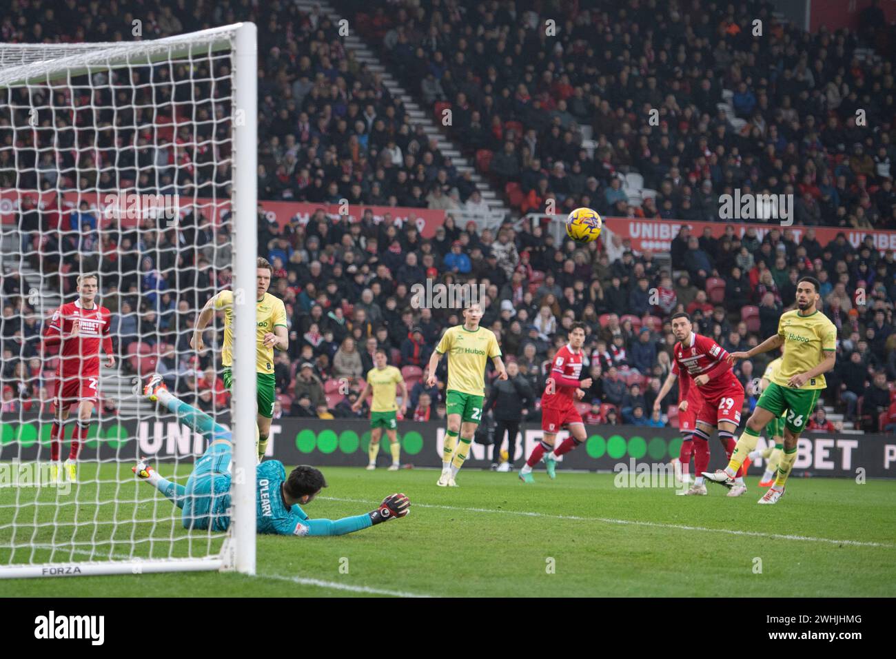 Bristol City Goalkeeper Max O'Leary makes a save down to his right ...