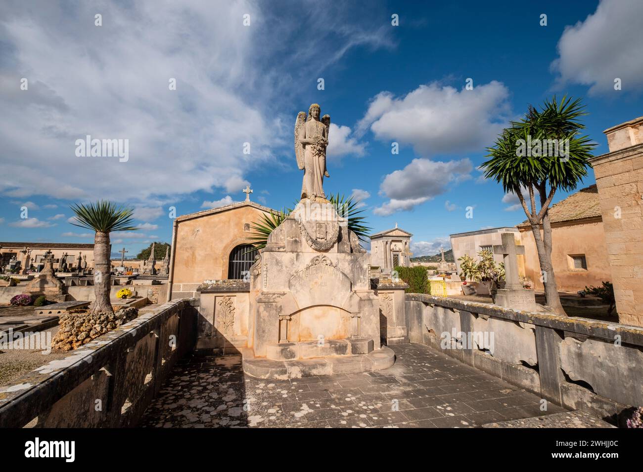 Angel over Miguel Mataro funerary monument Stock Photo - Alamy