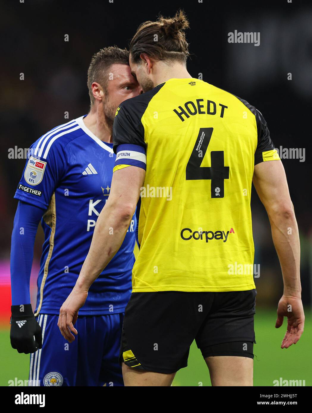 Leicester City's Jamie Vardy (left) and Watford's Wesley Hoedt go head ...
