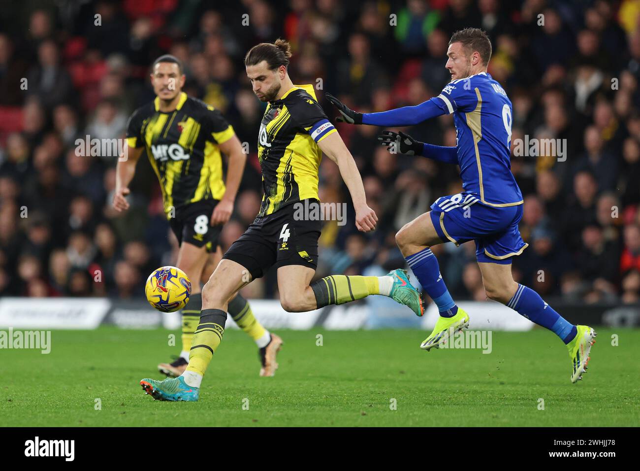 Watford's Wesley Hoedt (left) and Leicester City's Jamie Vardy (right ...