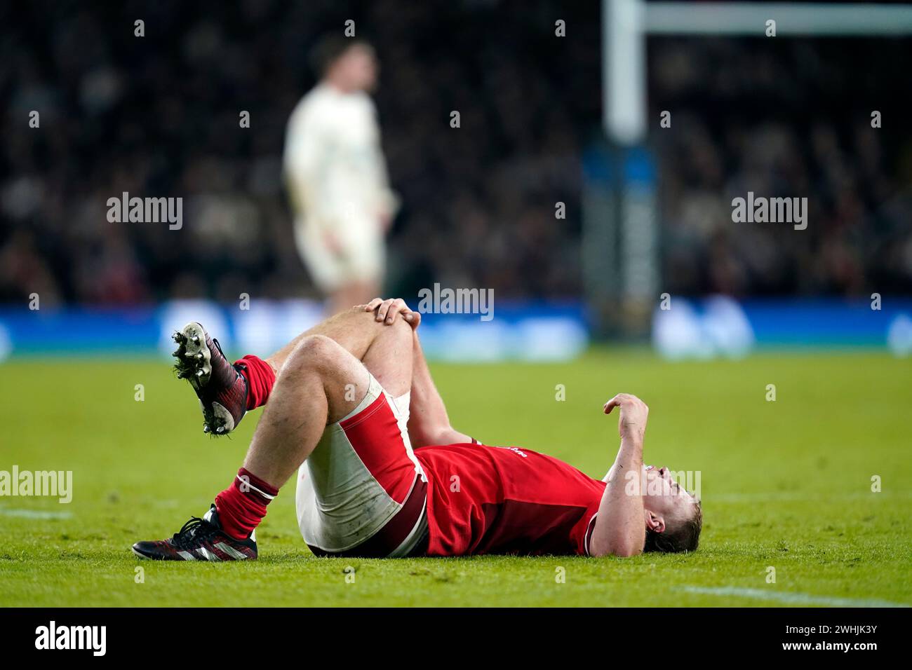 Wales's Archie Griffin lies injured during the Guinness Six Nations ...