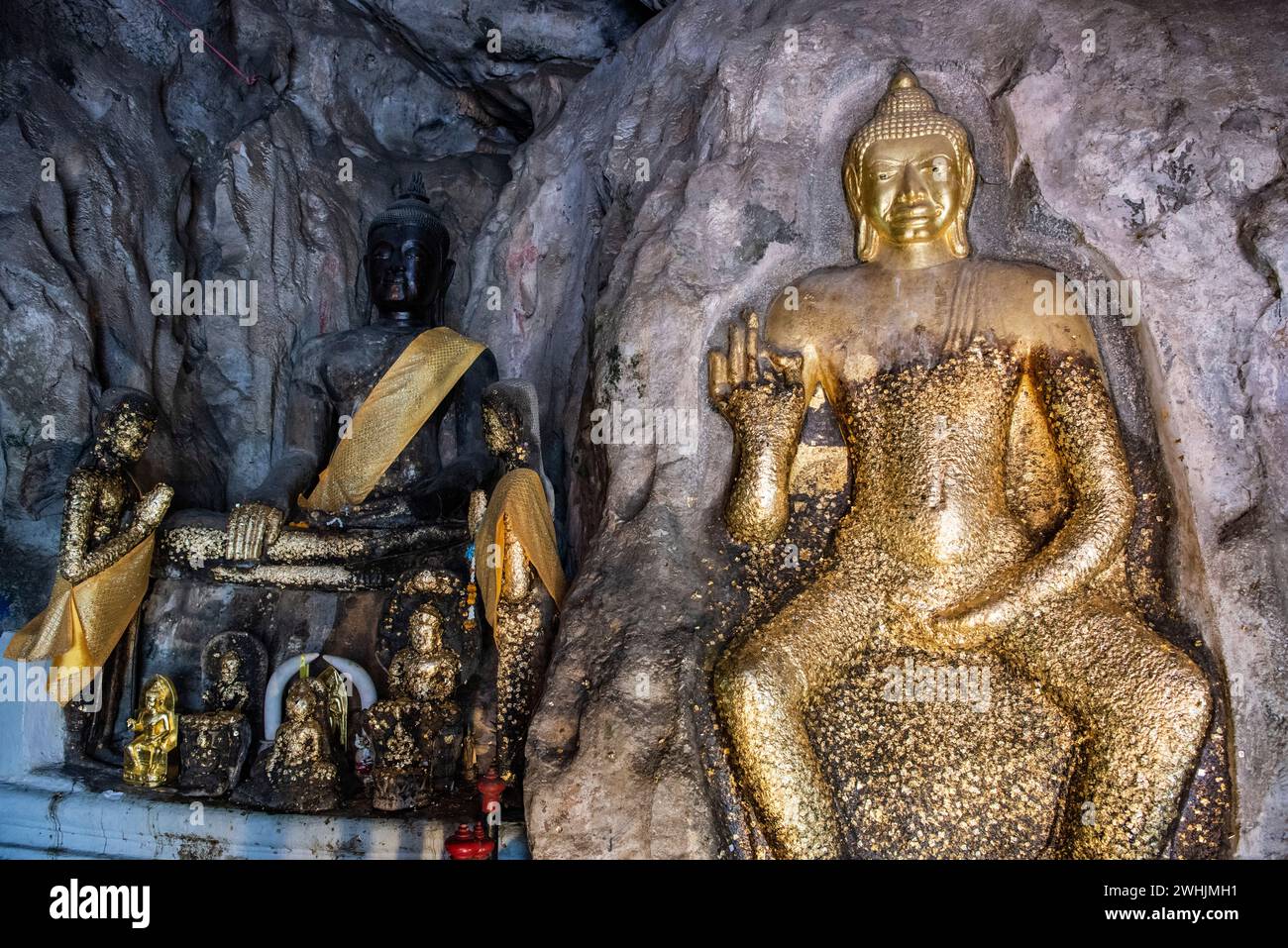 The Phra Phuttha Chai Buddha sculpture at the Tham Ruesi Khao Ngu cave ...