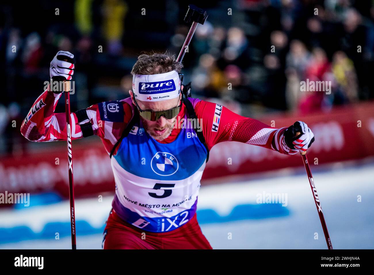 Simon Eder of Austria competes in the men's 10 km sprint during the ...