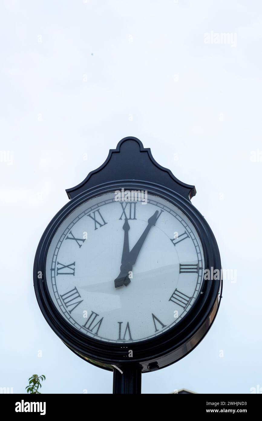 Antique street clock on pillar hi-res stock photography and images - Alamy