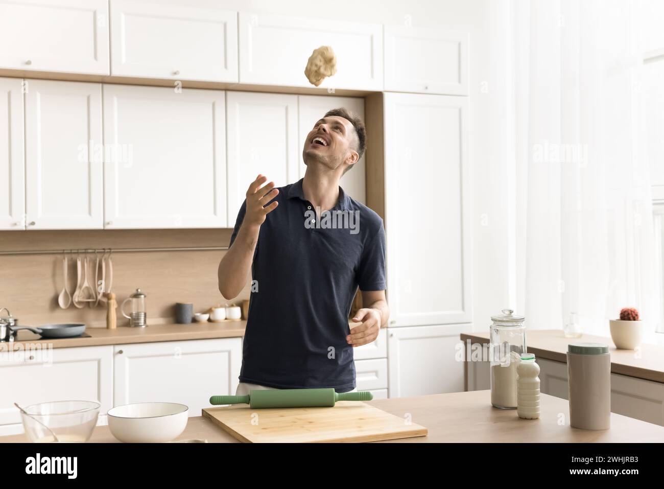 Baker throwing hi-res stock photography and images - Alamy