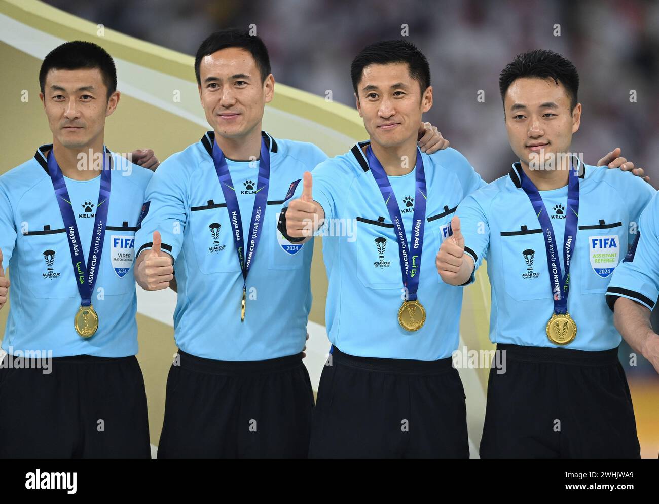Lusail, Qatar. 10th Feb, 2024. Referee Fu Ming, Zhou Fei, Ma Ning and ...