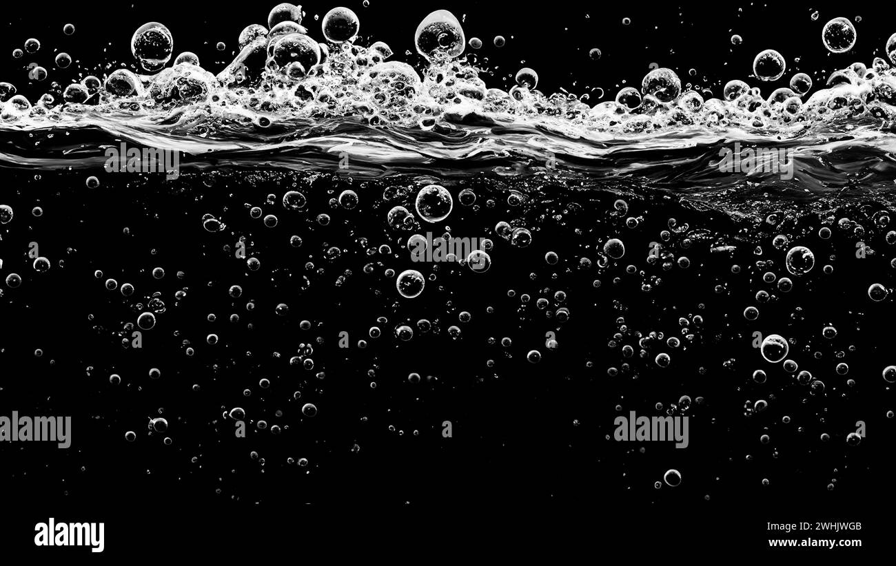 Soda water bubbles splashing underwater against black background. Soda liquid texture that ...