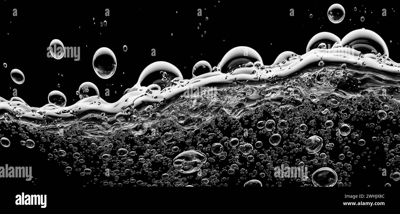 Soda water bubbles splashing underwater against black background. Soda ...