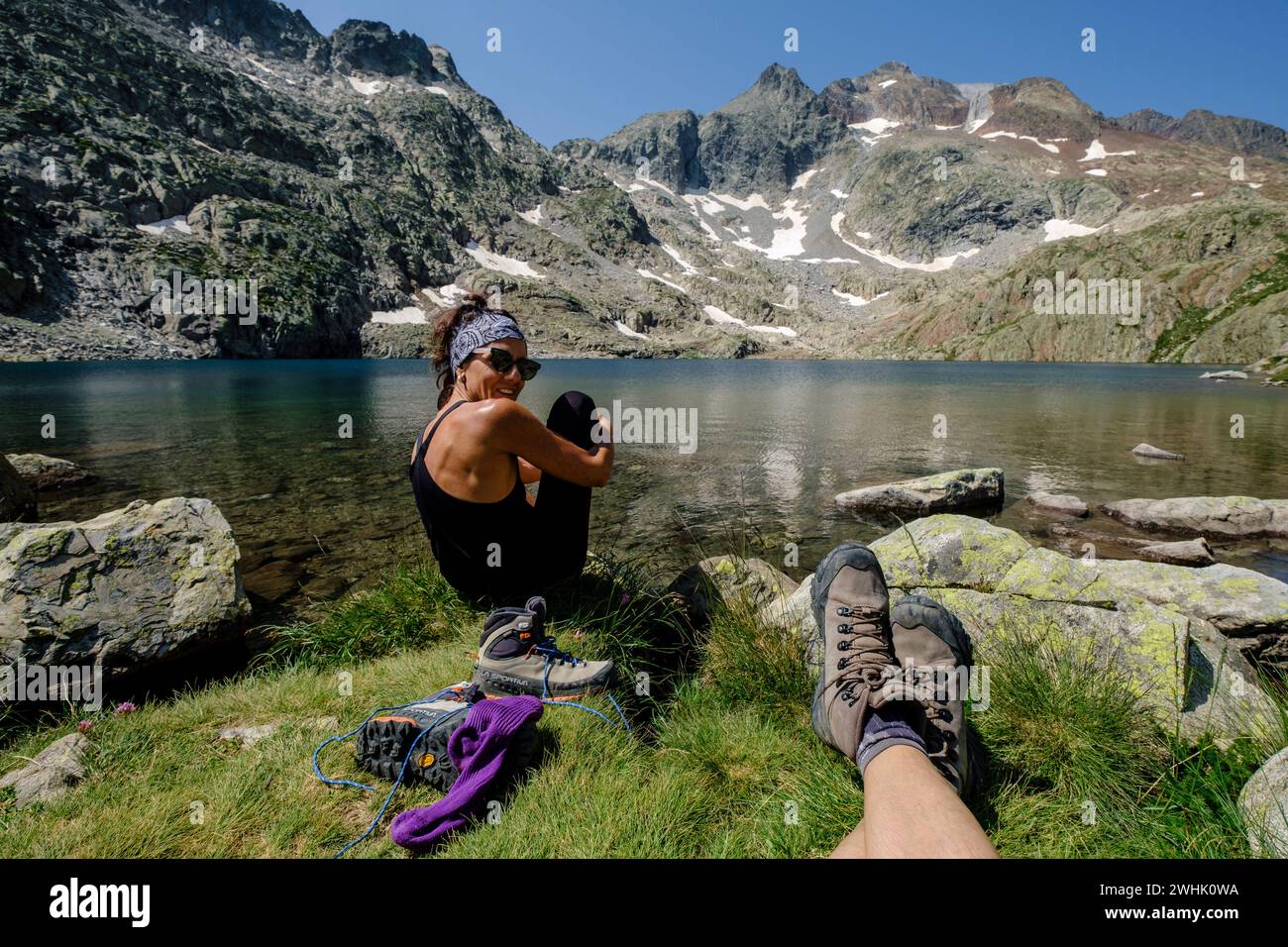 Feet in boots relaxing Stock Photo - Alamy