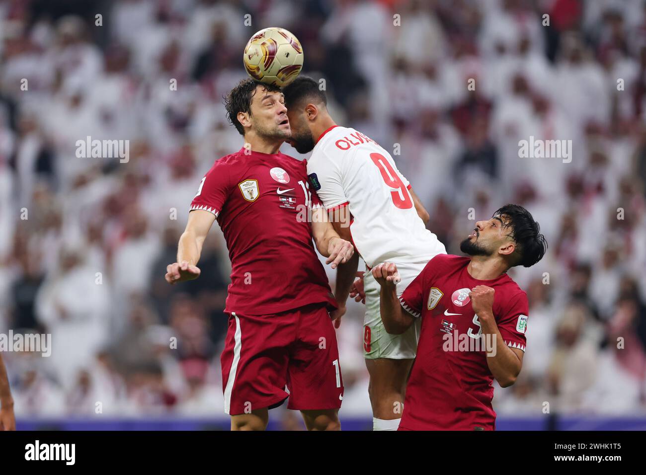 Lusail, Qatar. 10th Feb, 2024. (L to R) Lucas Mendes (QAT), Ali Olwan ...