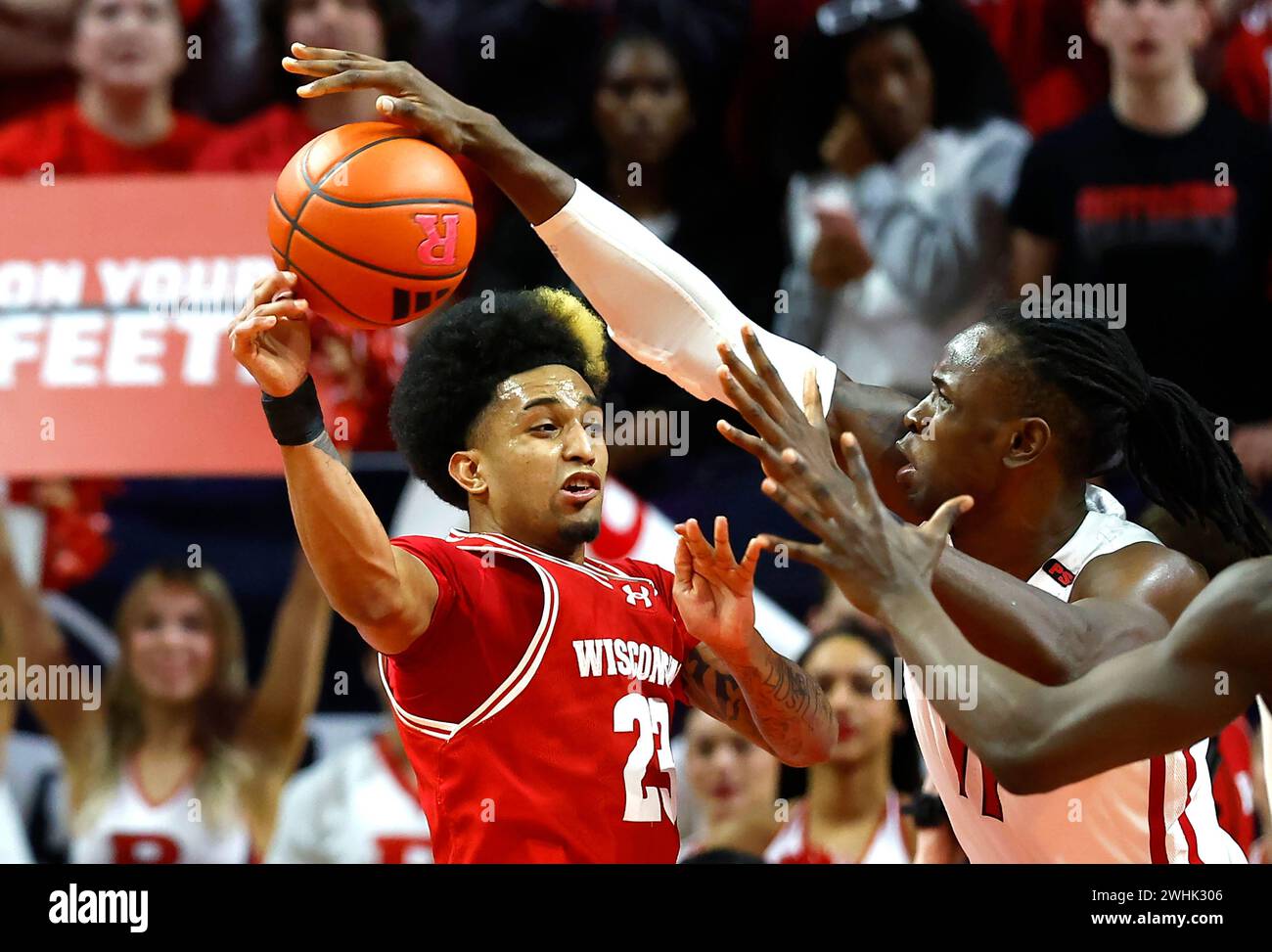 Wisconsin guard Chucky Hepburn (23) drives to the basket against Rutgers center Clifford Omoruyi ...