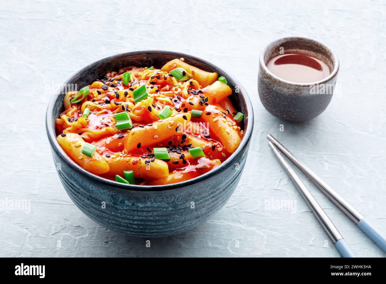 Rabokki, tteokbokki or topokki with ramen, Korean street food, spicy ...