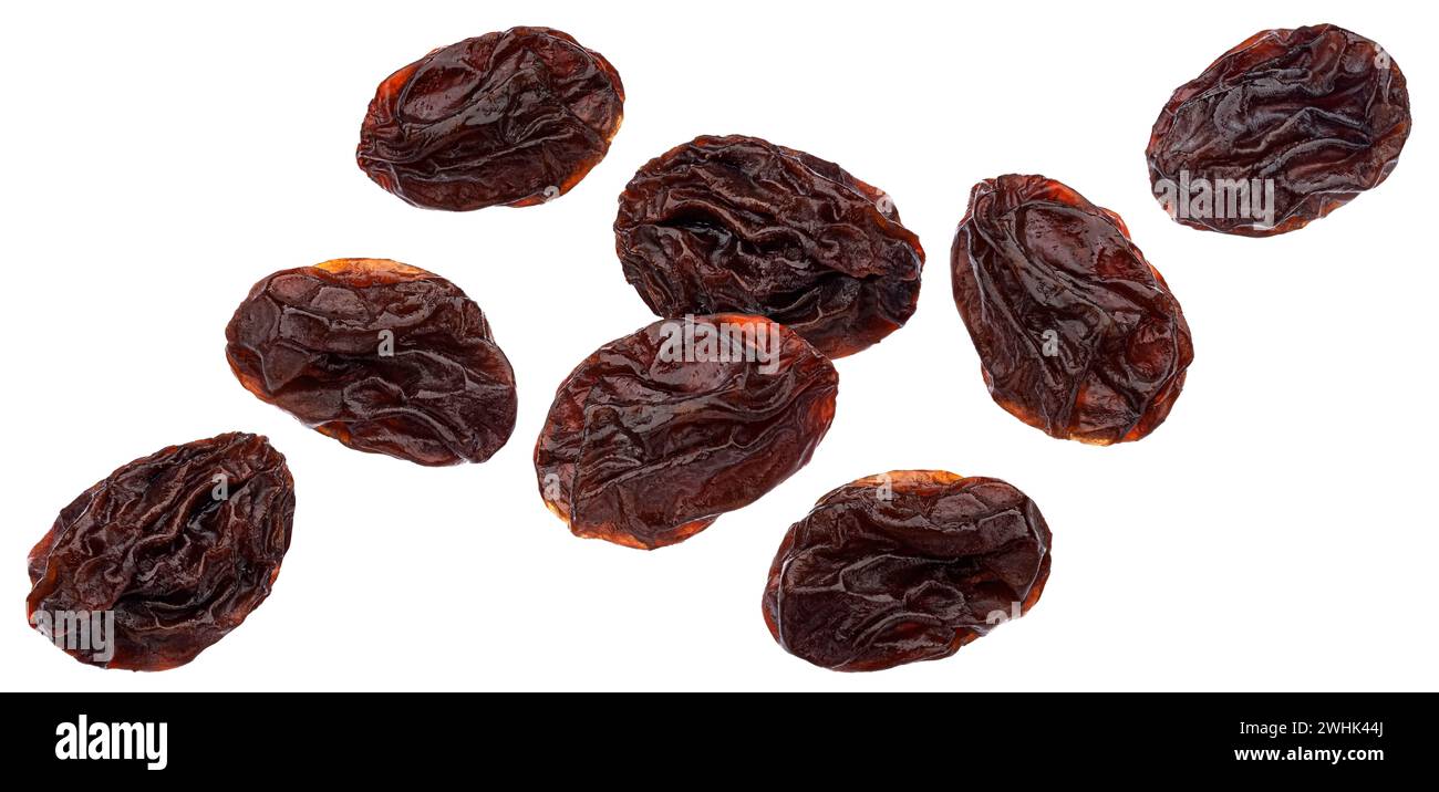Falling raisins isolated on white background with clipping path, full ...