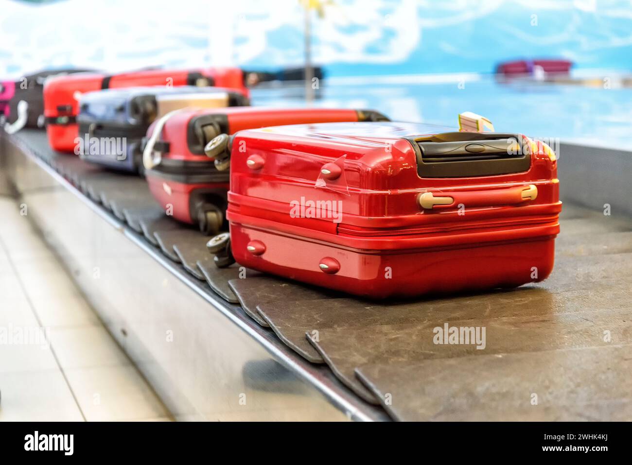 Baggage at the baggage claim at an airport Stock Photo - Alamy
