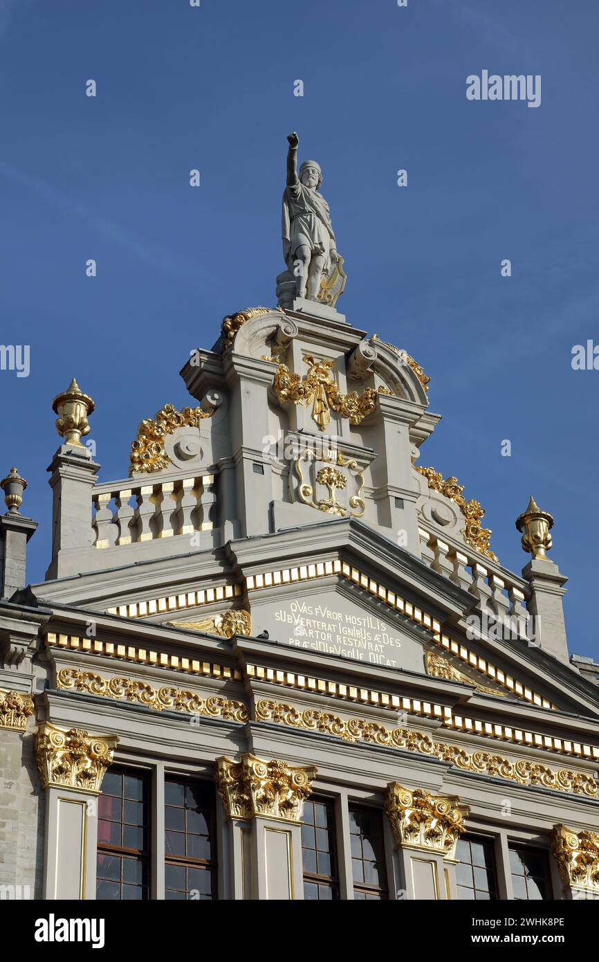Statue of Saint Homobonus of Cremona on De Gulden Boot building in ...