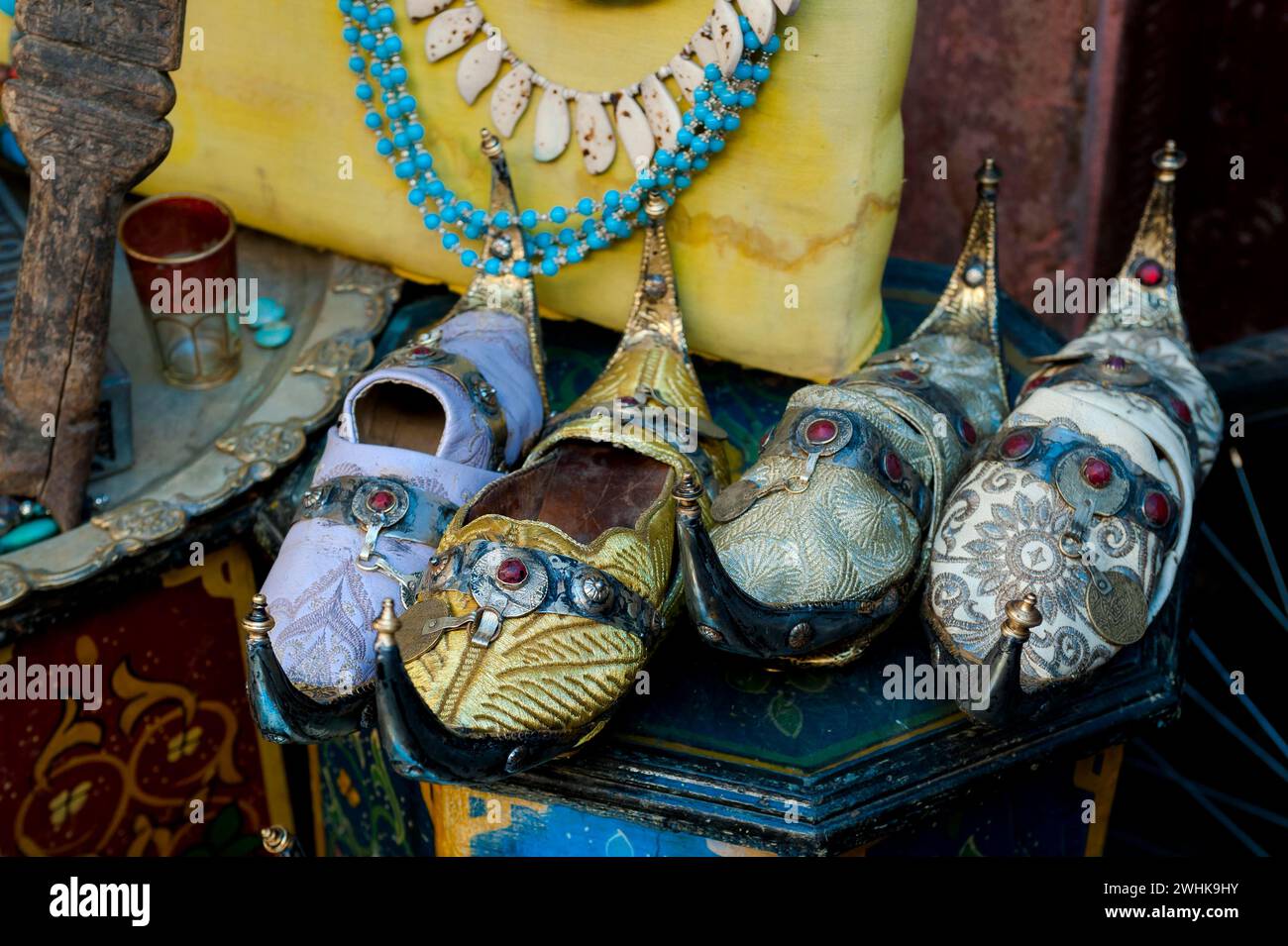 Traditional decorated babouche shoes in the medina, shop, bazaar, flea ...