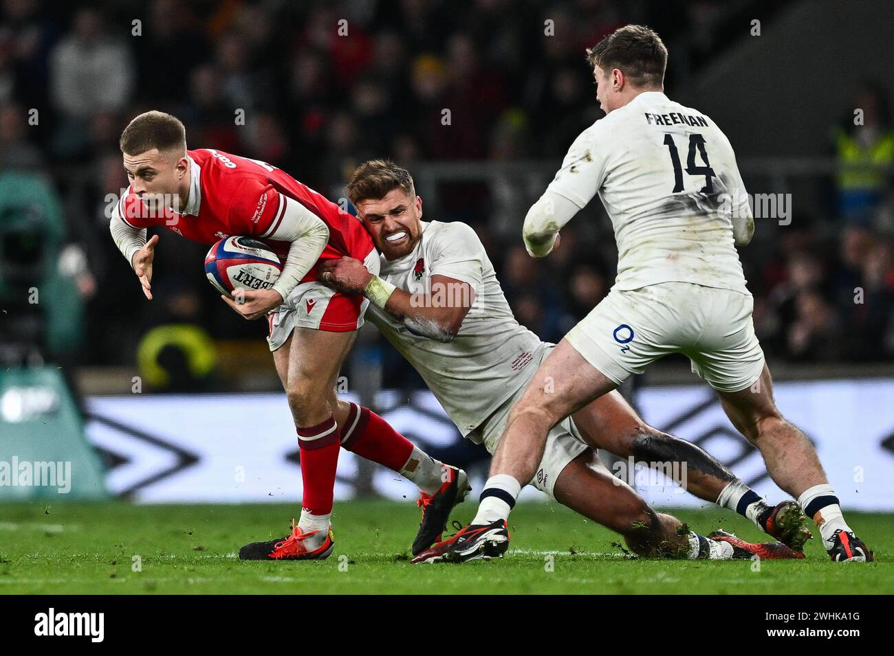Cameron Winnett of Wales is tackled by Henry Slade of England during ...