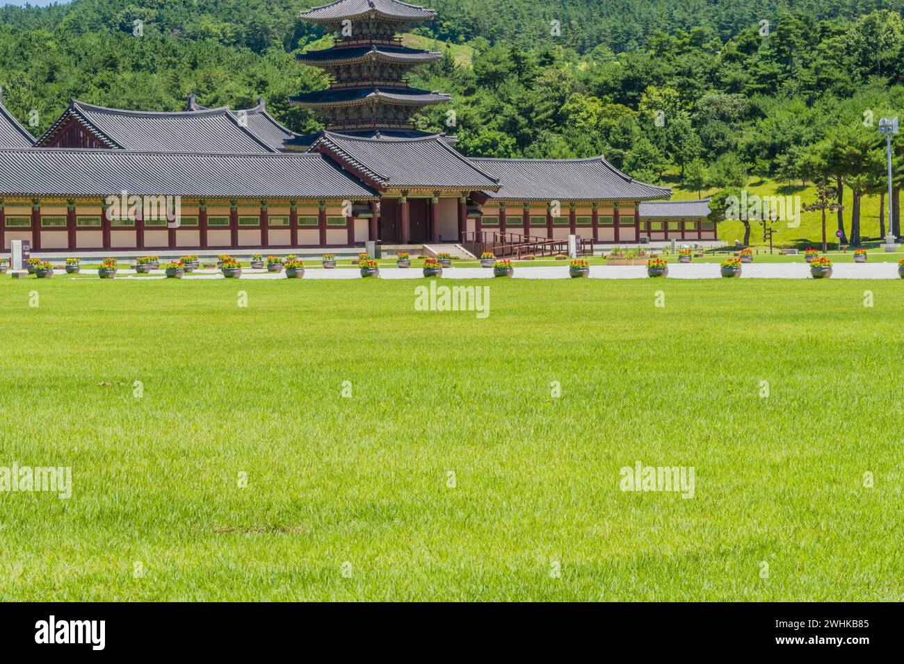 Buildings of main gate of Neungsa Baekje Temple with five story pagoda ...