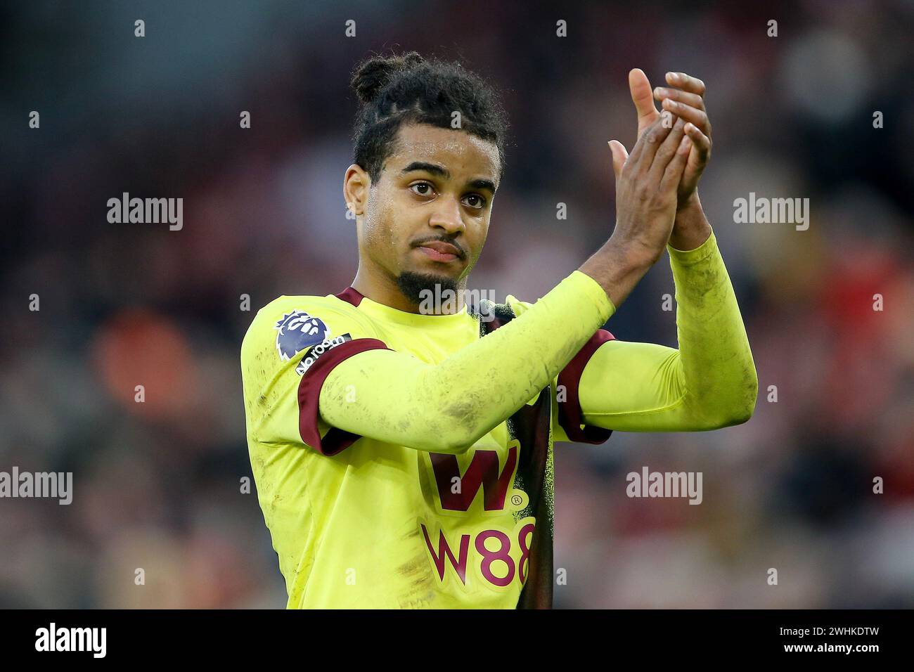 Lorenz Assignon of Burnley shows his appreciation to the fans at the ...
