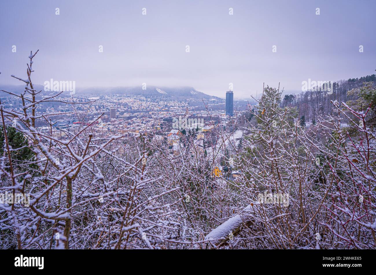 Jena in winter with the Jentower in the city centre under a cloudy sky ...