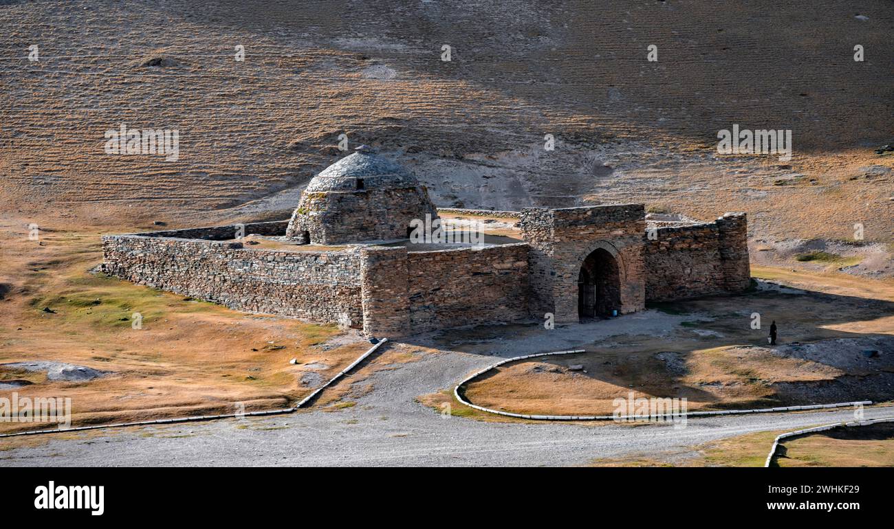 Historic caravanserai Tash Rabat from the 15th century, with yellow ...