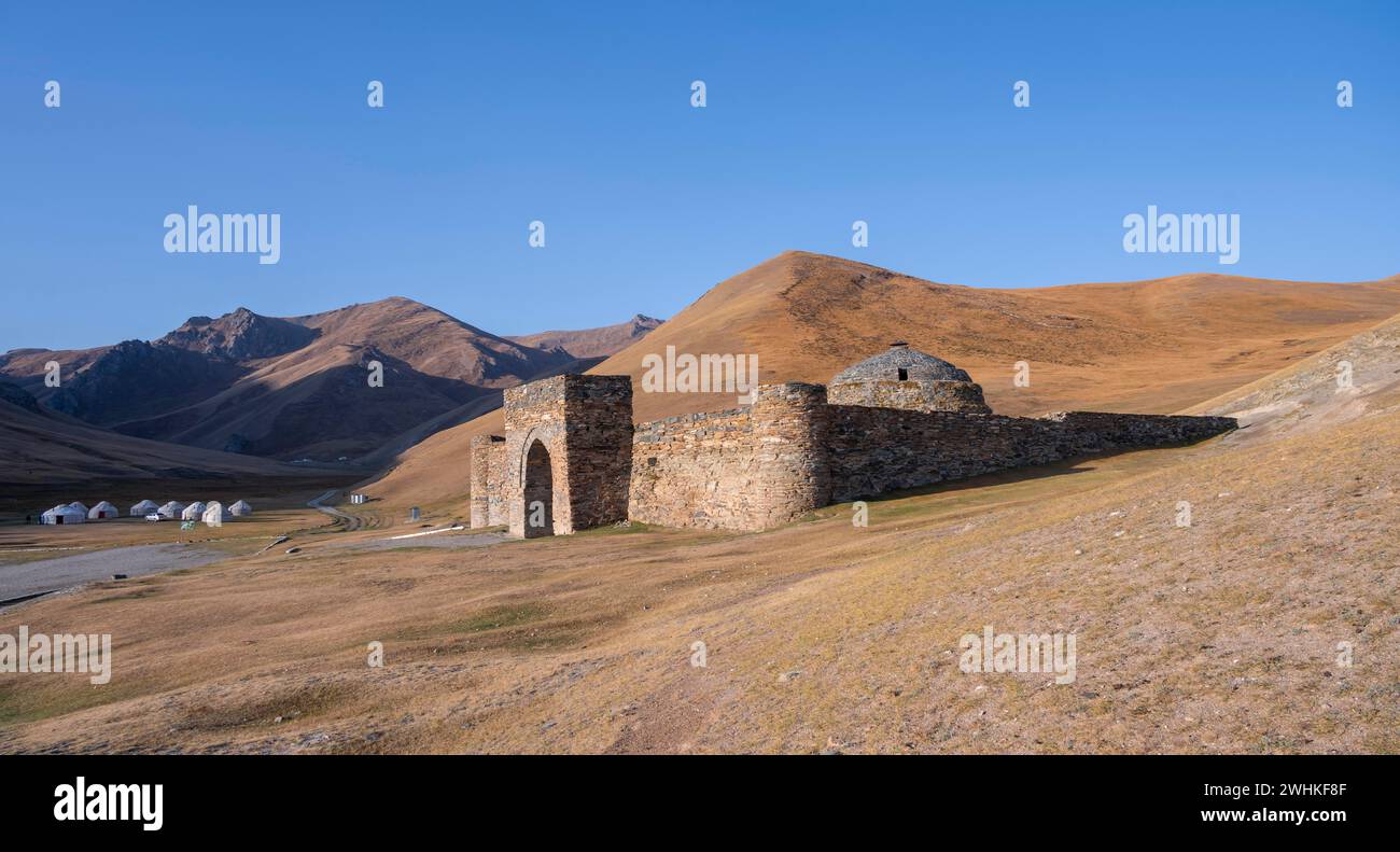 Historic caravanserai Tash Rabat from the 15th century, with yellow ...