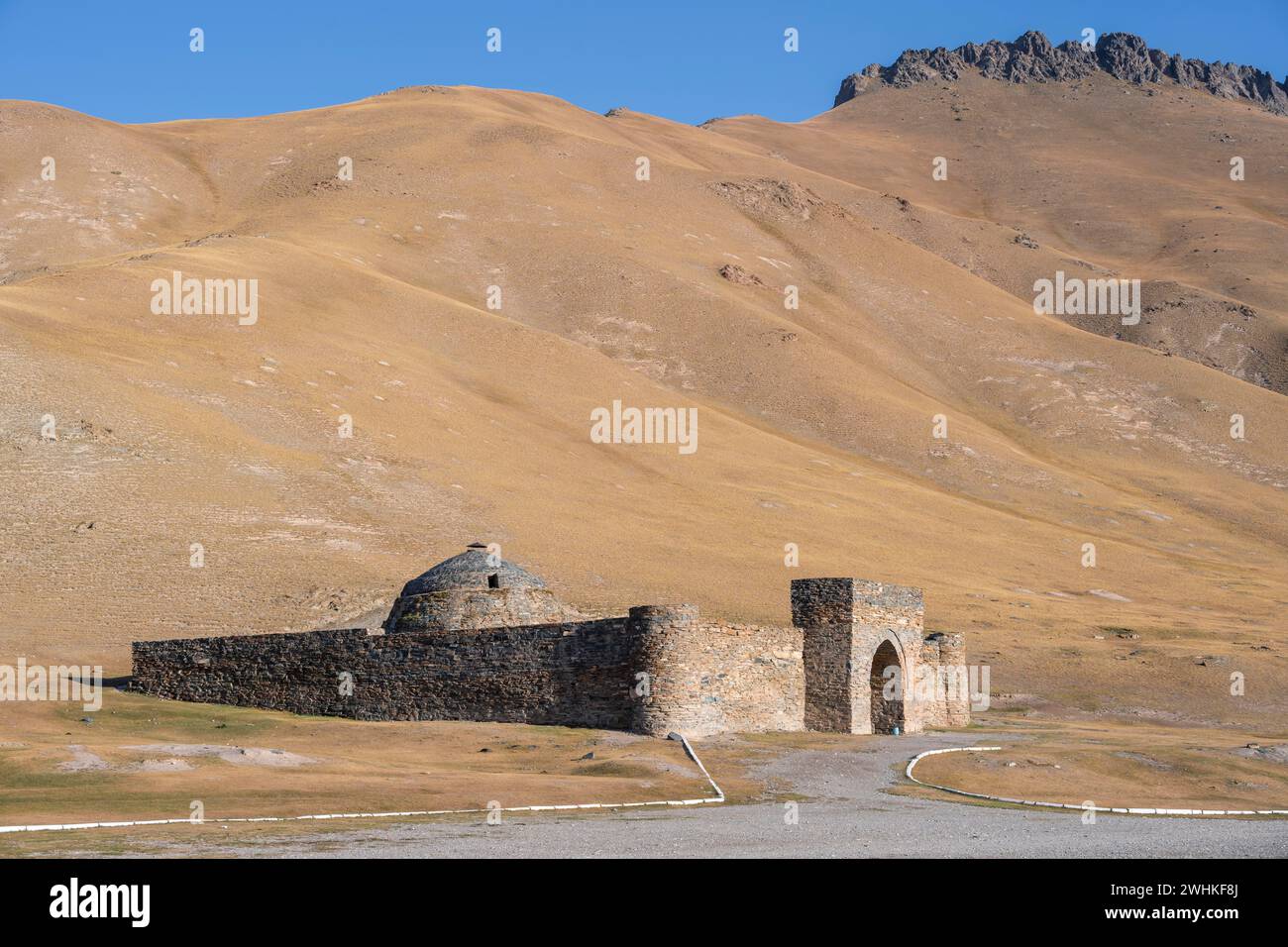 Historic caravanserai Tash Rabat from the 15th century, with yellow ...