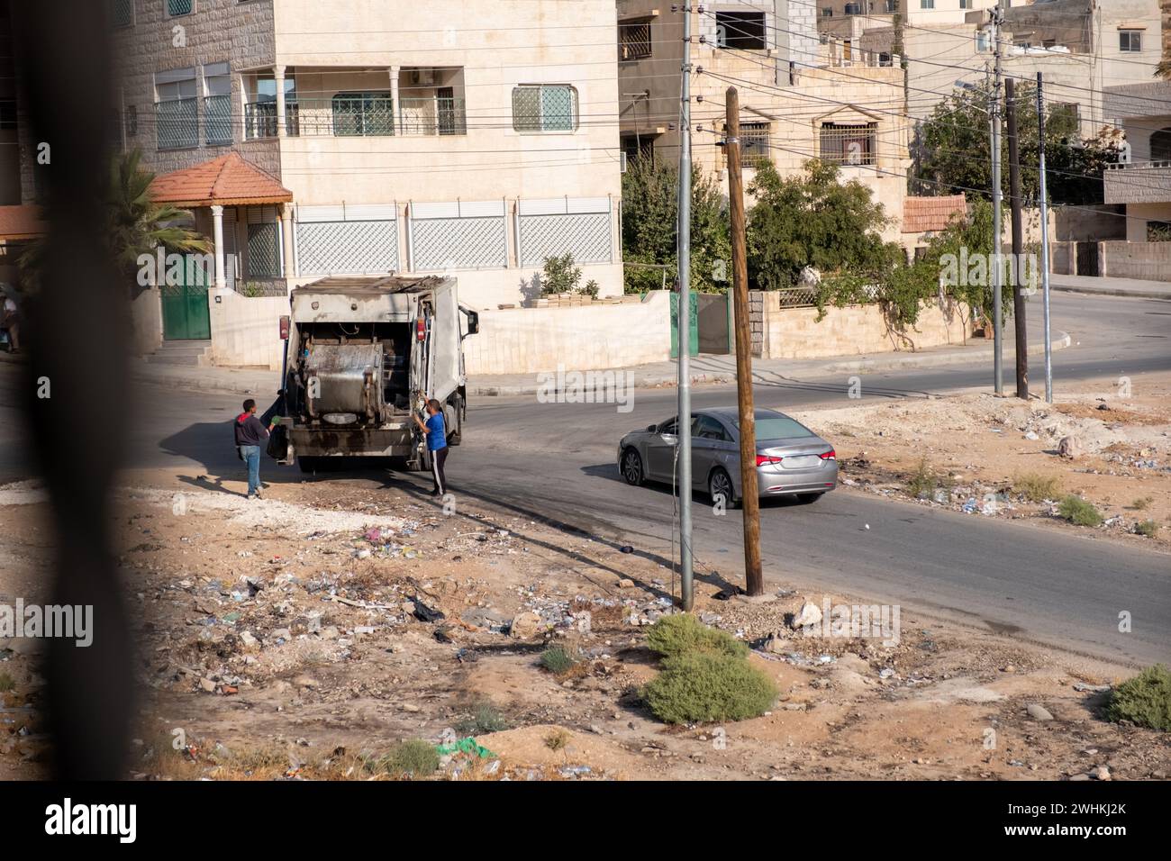 garbage cleaning in arabic countries with two worker Stock Photo - Alamy