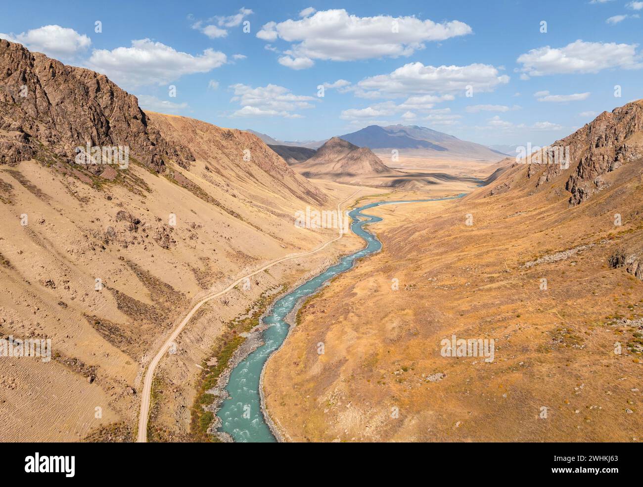 Mountain valley with wild river between hills, Bolgart Valley, Naryn ...