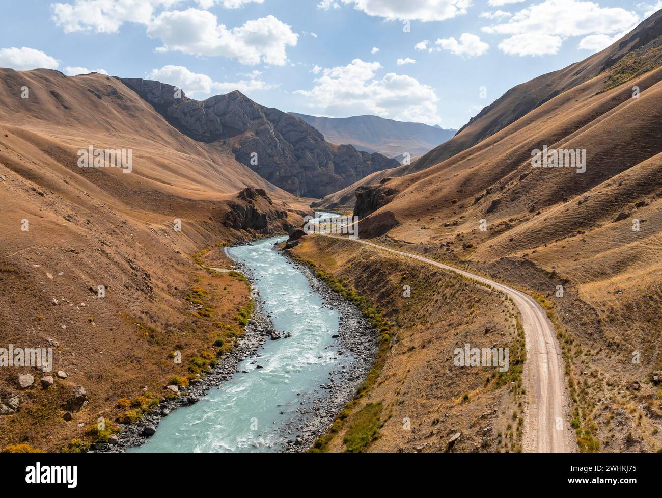 Mountain valley with wild river between hills, Bolgart Valley, Naryn ...