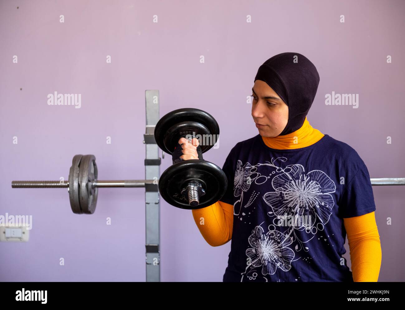 Muslim woman doing gymnastics hi-res stock photography and images - Alamy