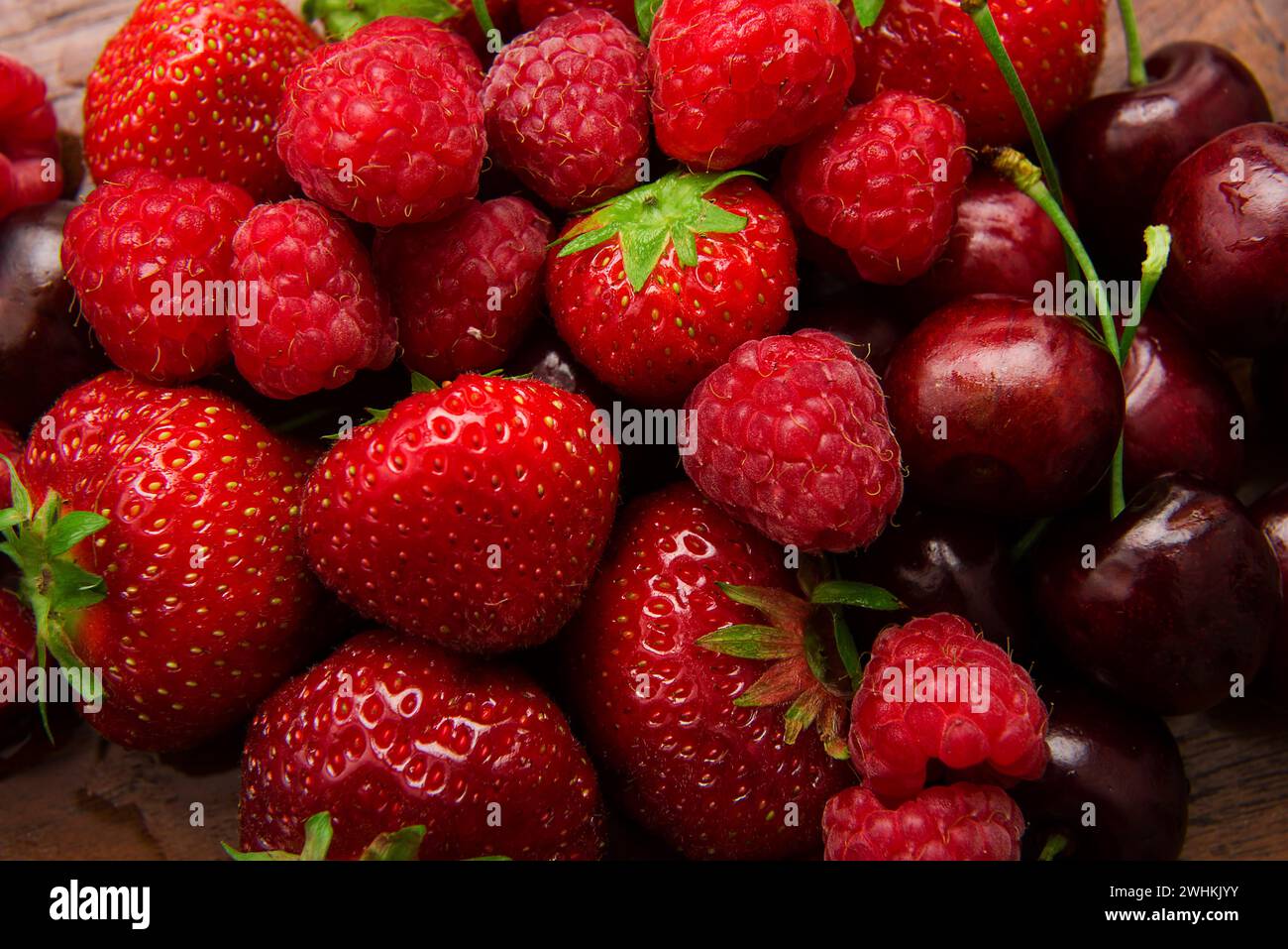 Delicious summer fruit, strawberry, raspberry, cherry Stock Photo - Alamy