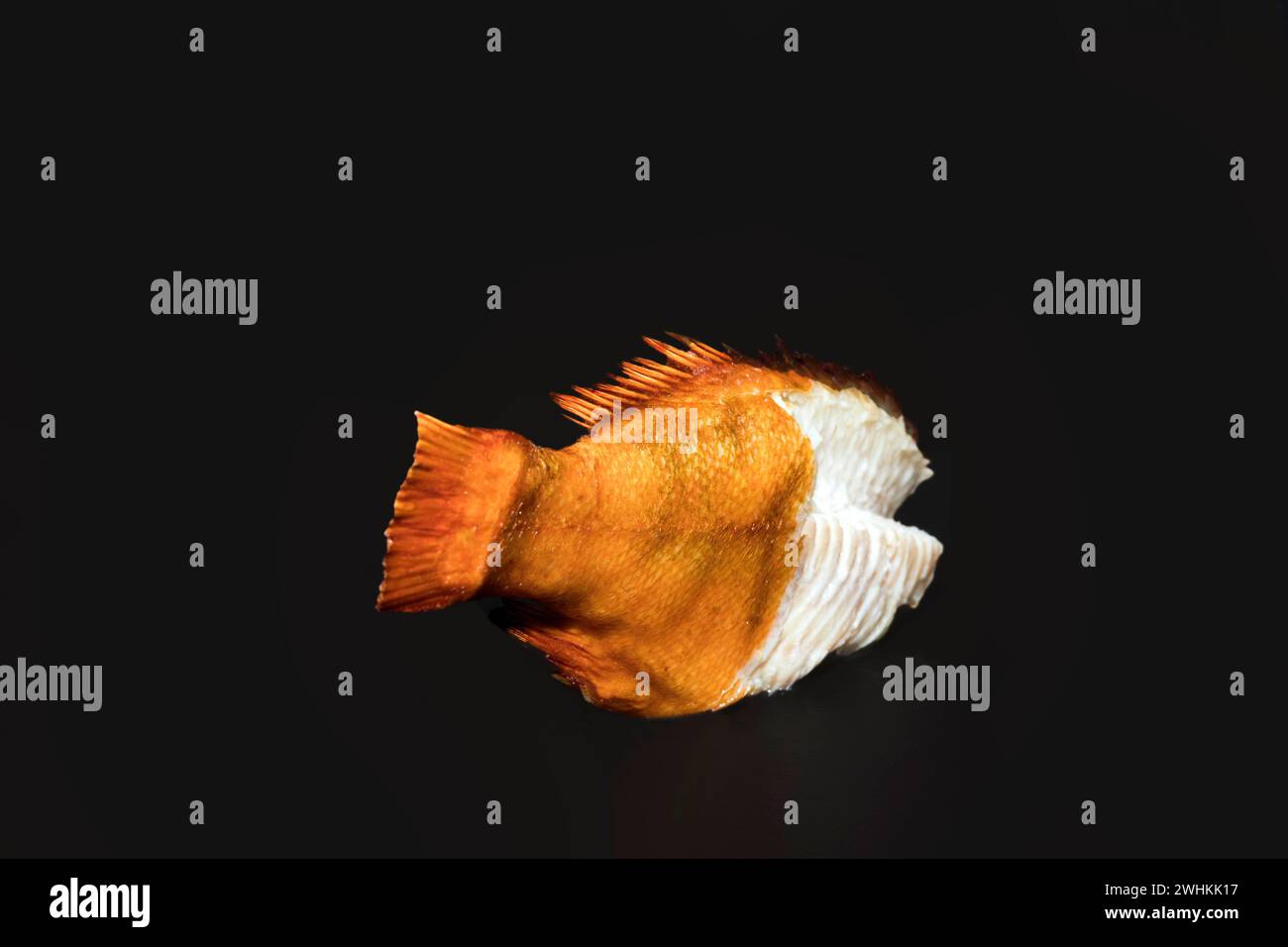 Smoked redfish without head, with half of the skin removed, food ...