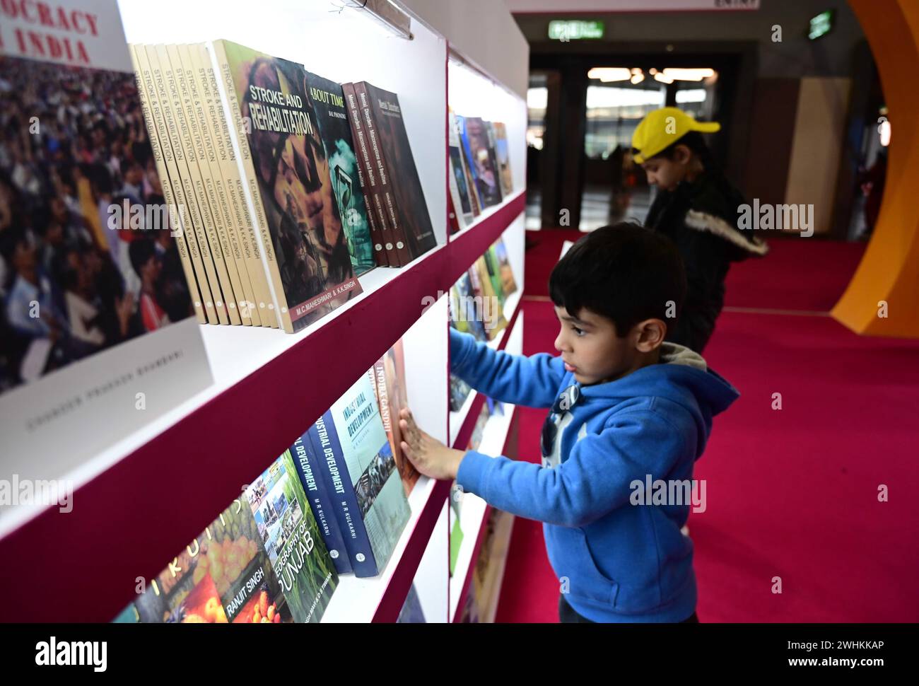 NEW DELHI, INDIA -FEBRUARY 10: Children at a book stall during World ...