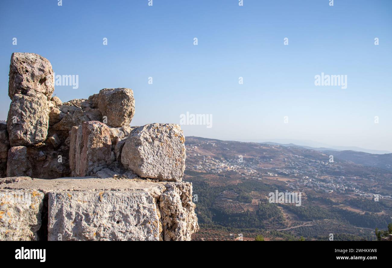 Remains of castle towers from above with village background Stock Photo ...