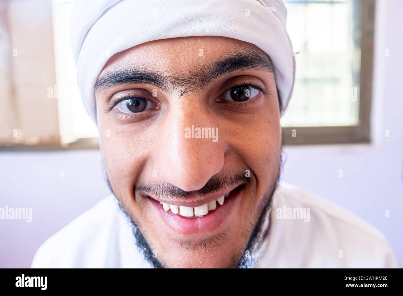 arabic man close up face look expression Stock Photo - Alamy