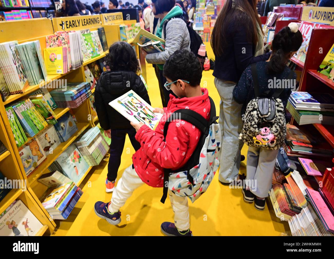 NEW DELHI, INDIA -FEBRUARY 10: Children at a book stall during World ...