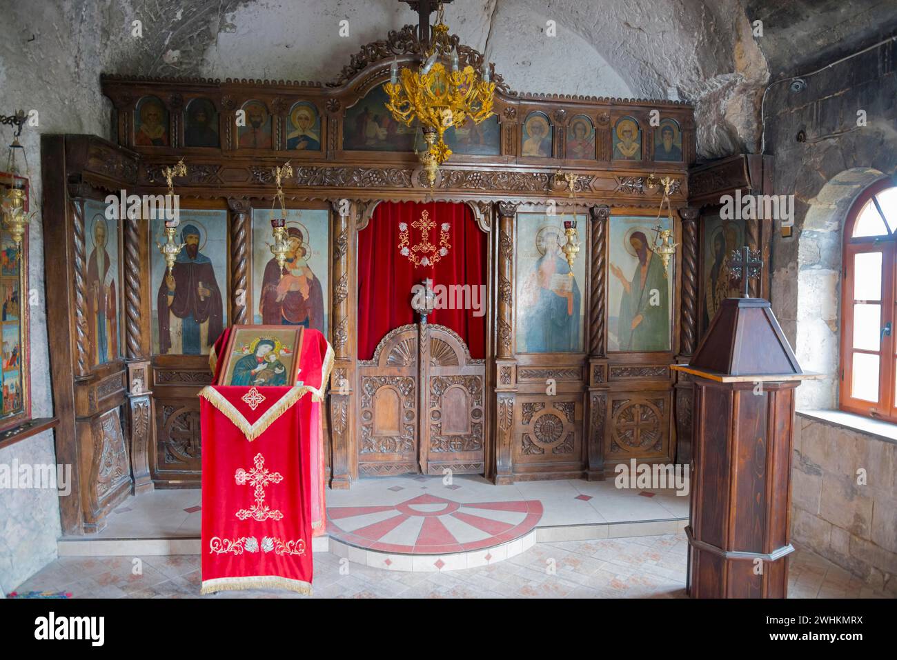 Interior of a cave church with icons and an altar, Bulgarian Orthodox ...