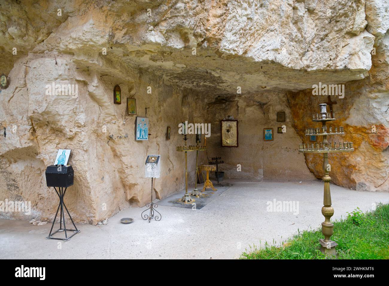 A cave wall with works of art and religious artefacts, Bulgarian ...