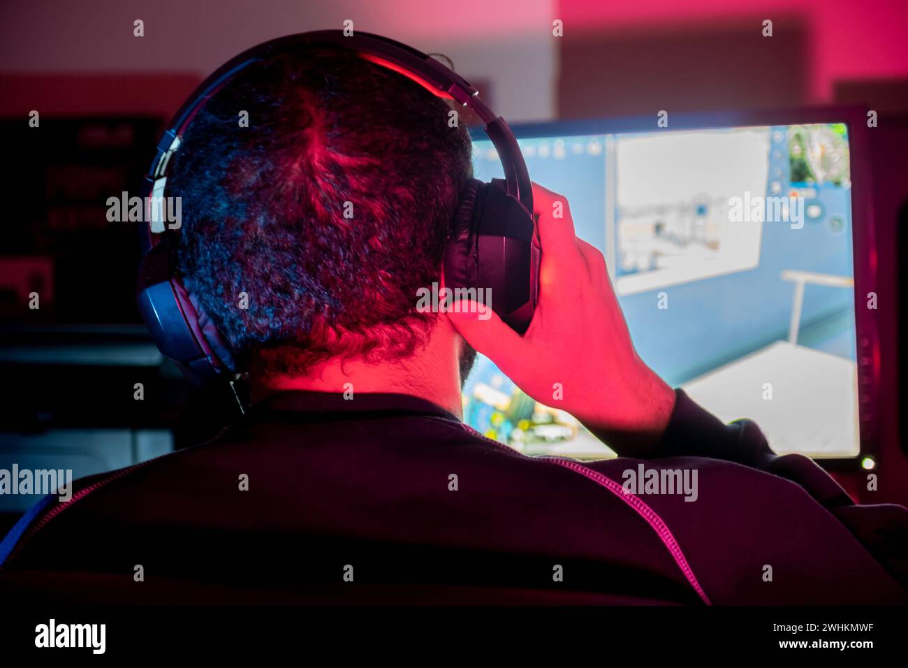 Computer game playing backlit hi-res stock photography and images - Alamy