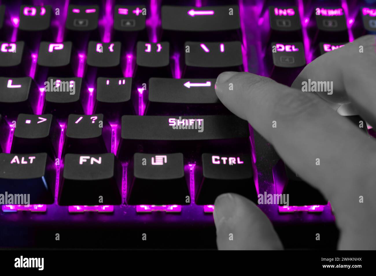 Professional guy typing on his keyboard and playing some game Stock ...