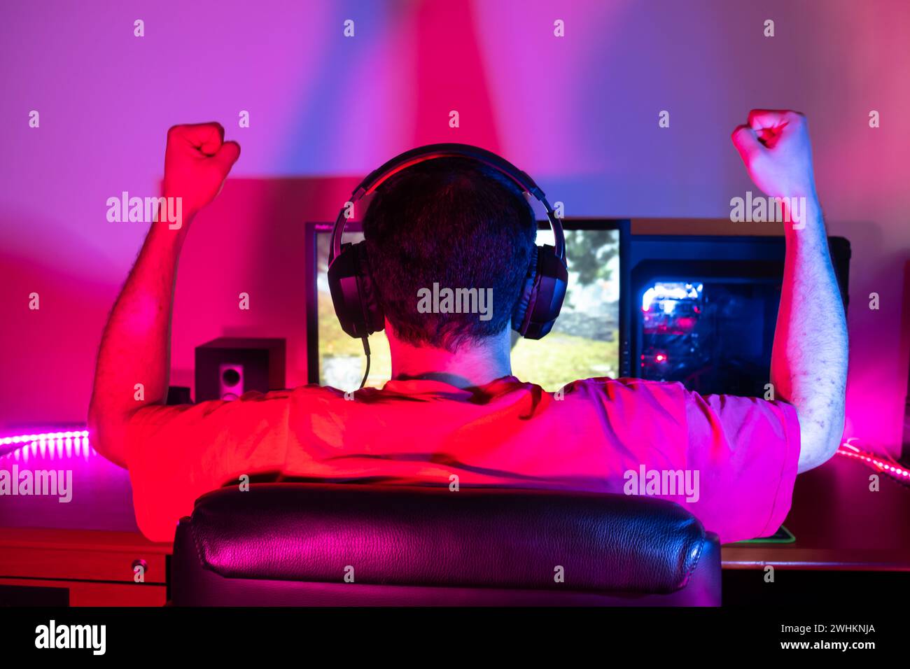 Guy feeling happy for his win Stock Photo - Alamy