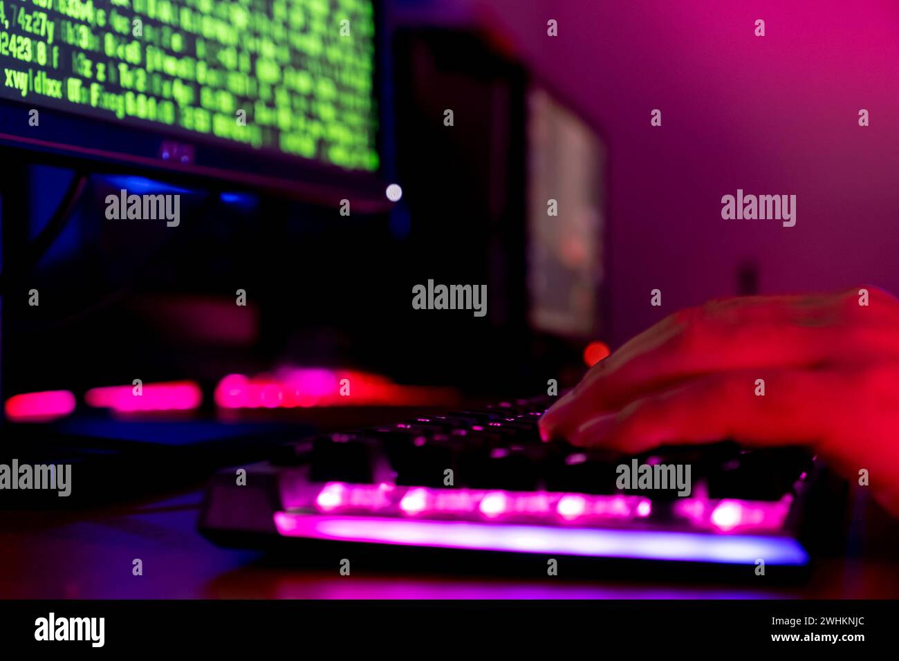 Hands typing on rgb keyboard hi-res stock photography and images - Alamy