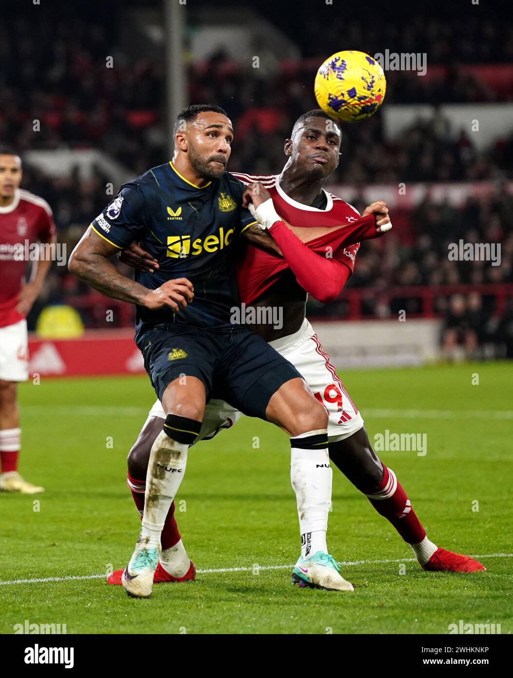 Newcastle United's Callum Wilson (left) and Nottingham Forest's Moussa ...