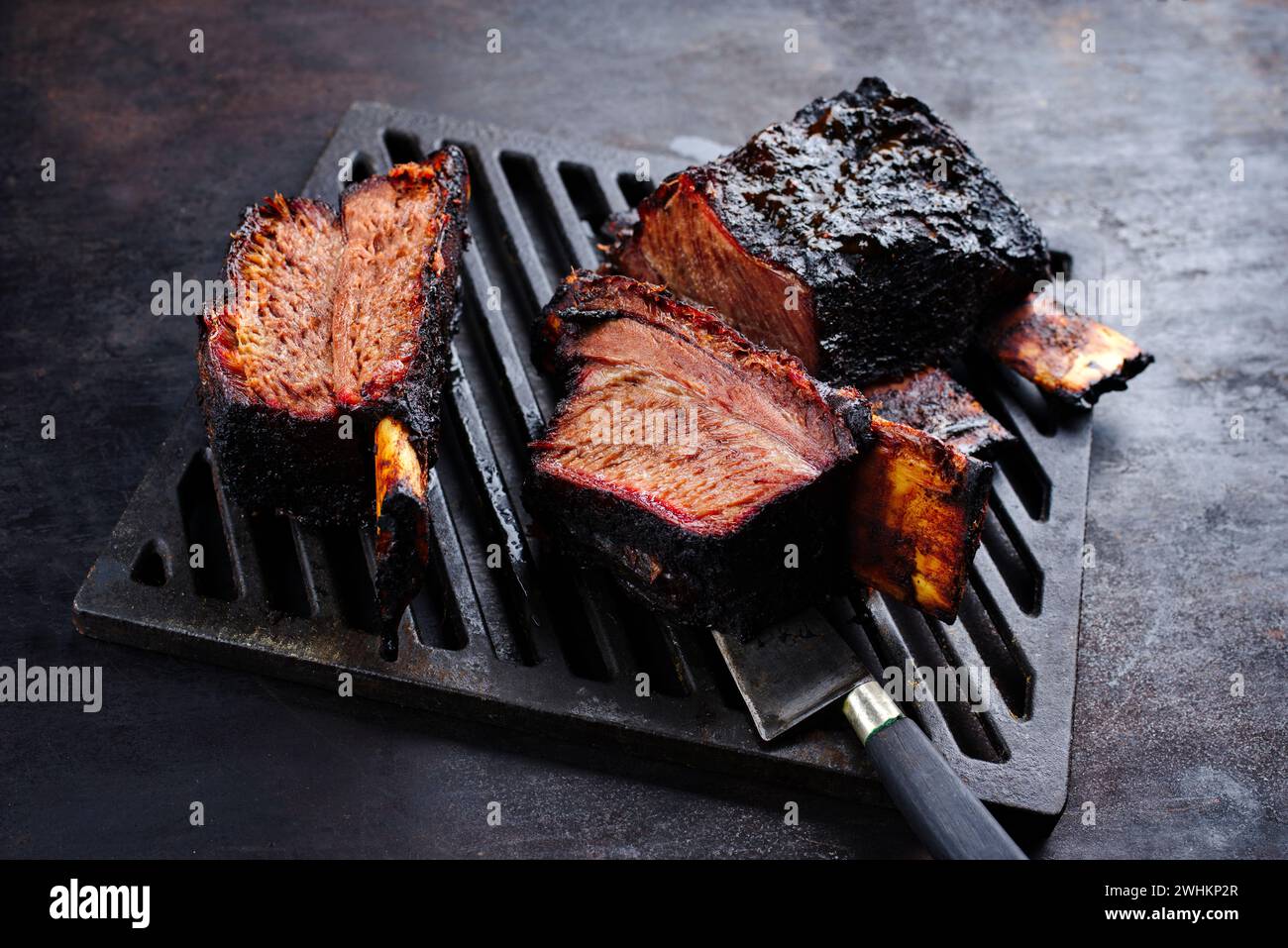 Traditional barbecue burnt chuck beef ribs marinated with spicy rub and ...