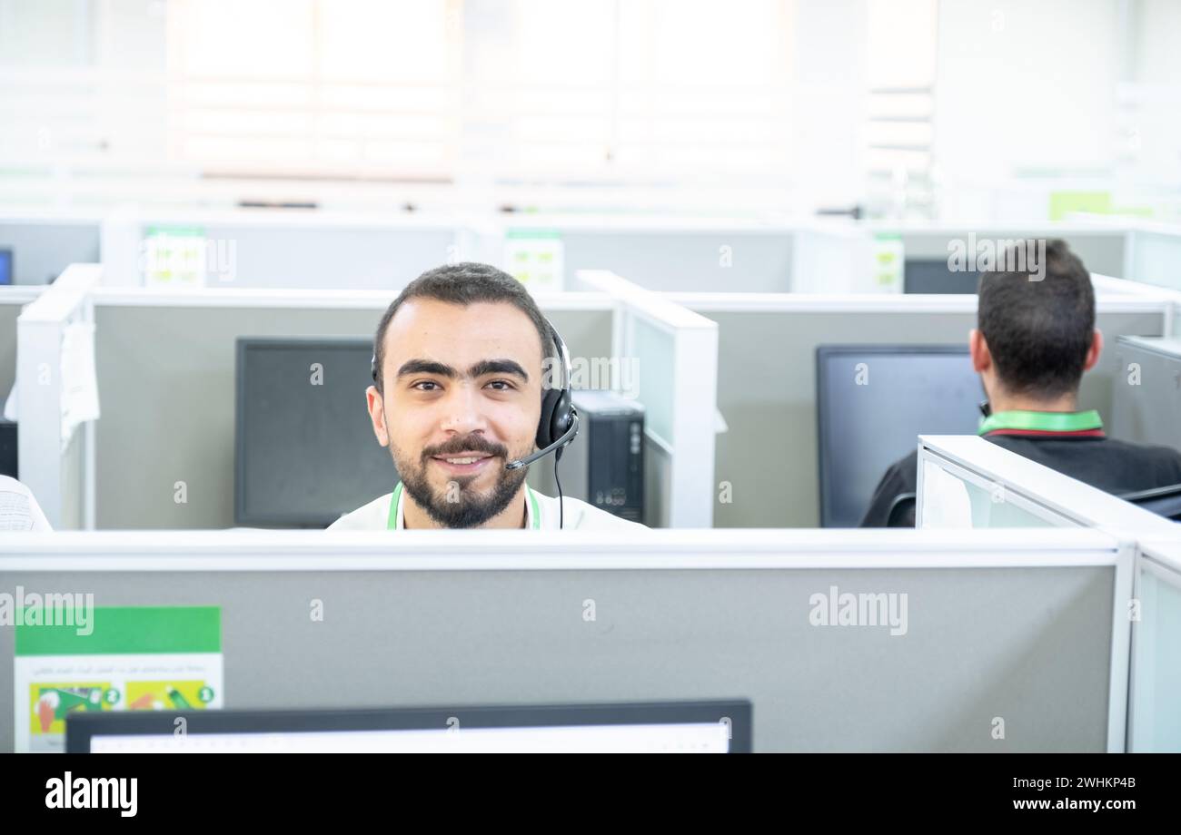 Cheerful men call center operator hi-res stock photography and images ...