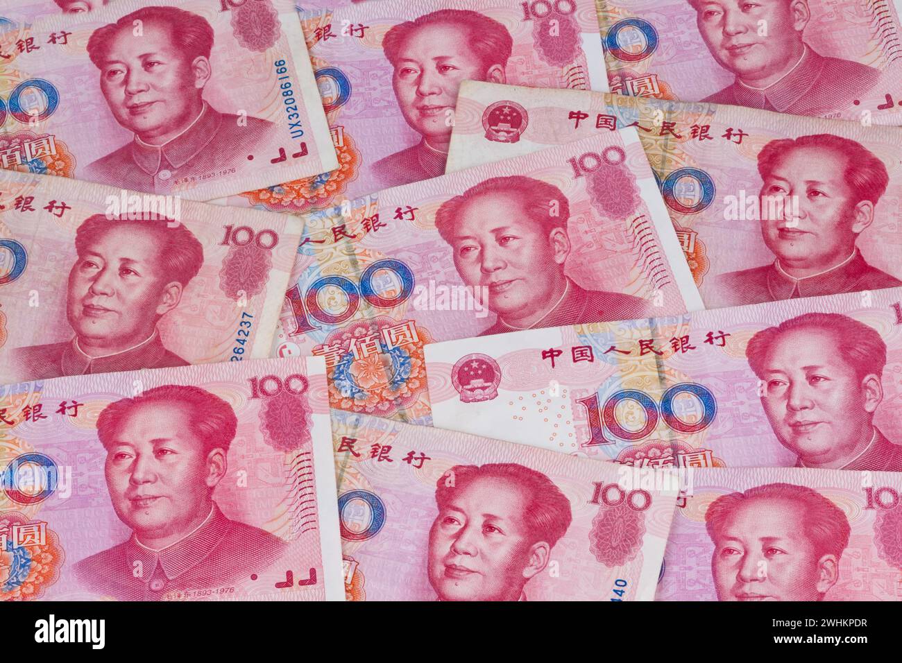 Chinese yuan banknotes lying next to each other on a table Stock Photo ...