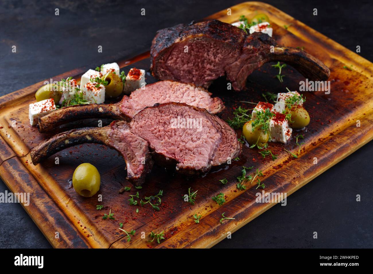 Traditional grilled duroc pork loin with Greek feta cheese and olives ...