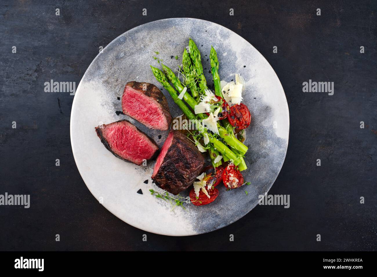 Italian barbecue dry aged chianina beef steak with green asparagus ...